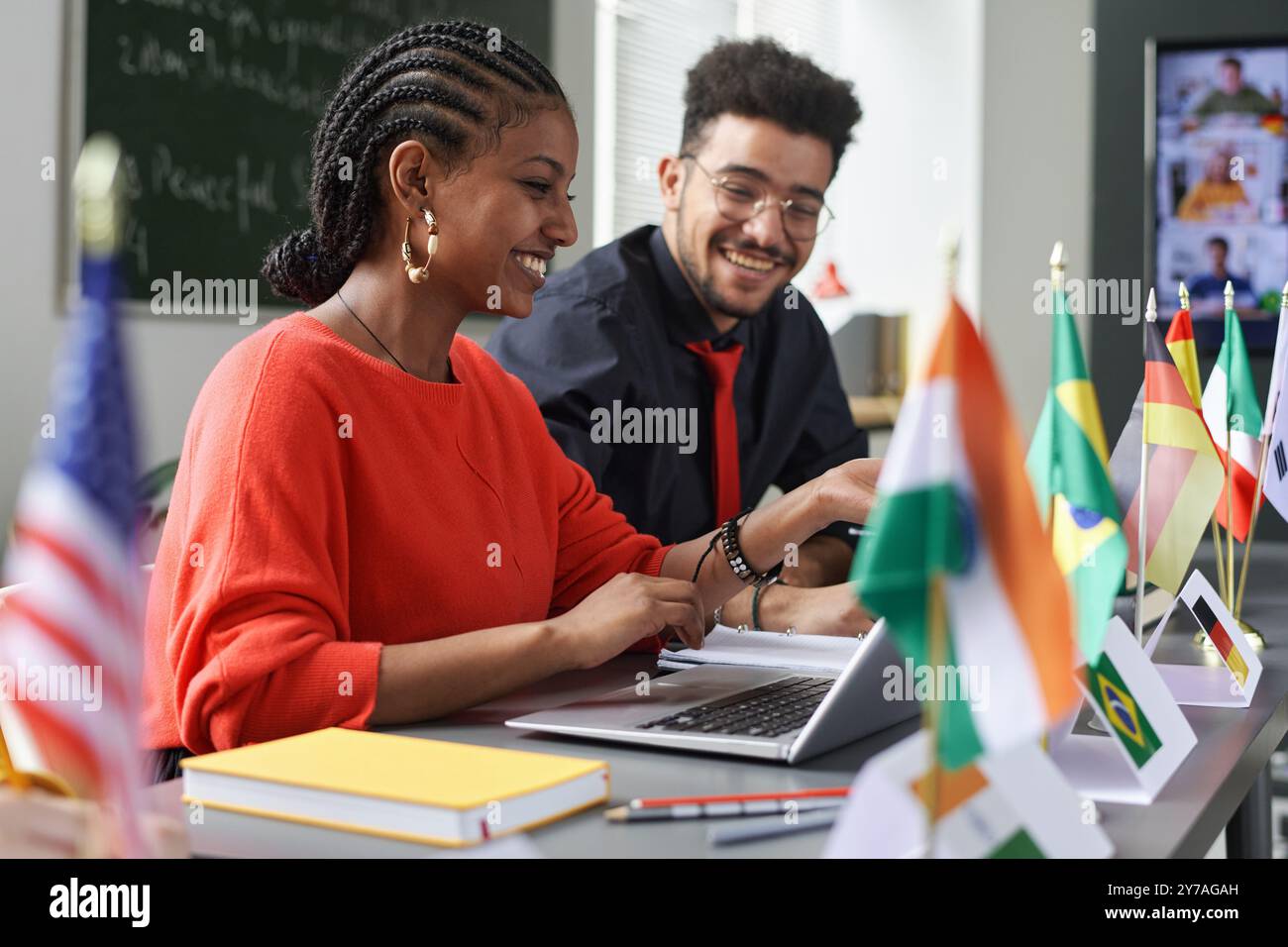 Smiling International Students Collaborating Stock Photo - Alamy