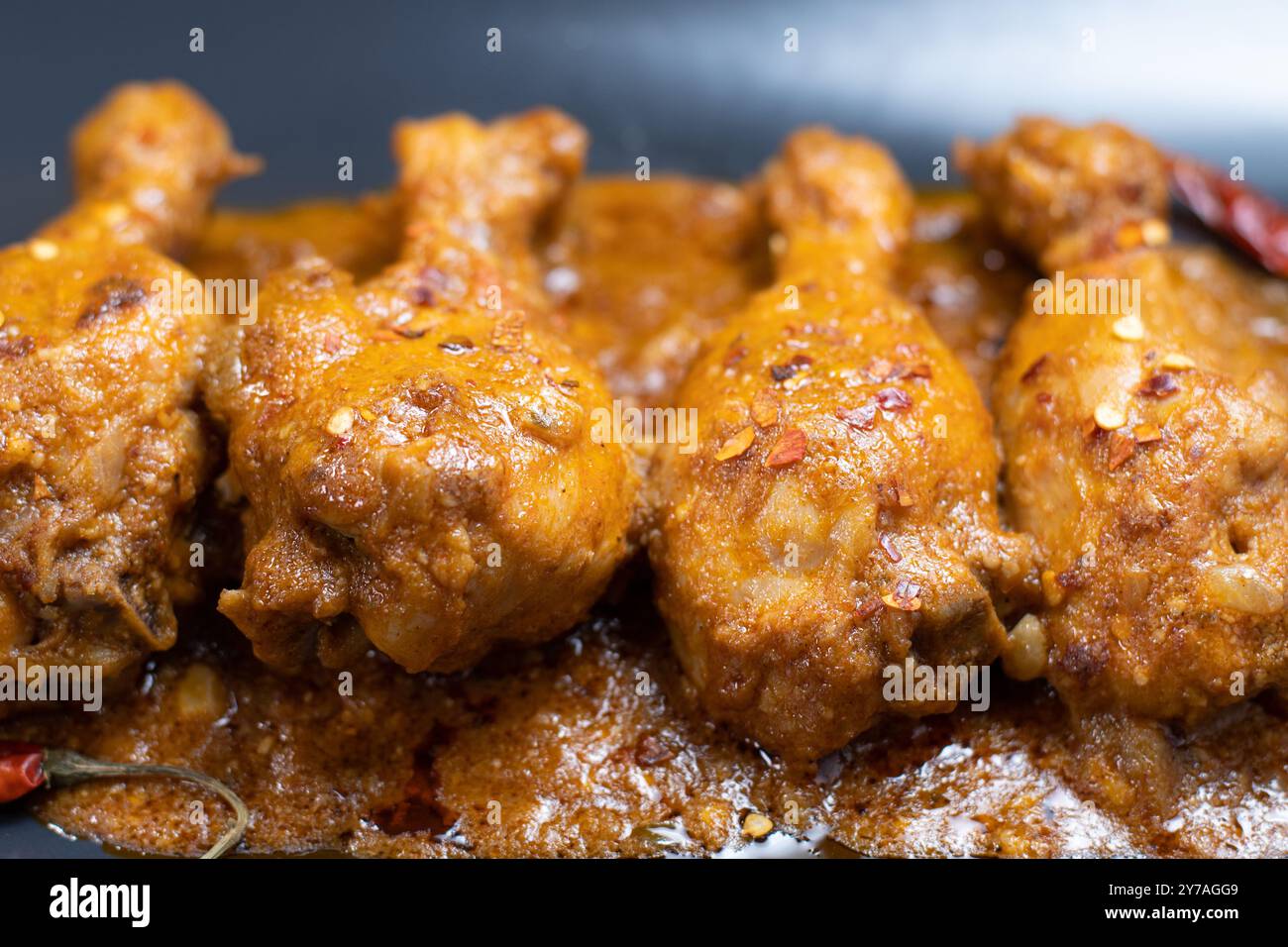 Chicken curry or masala, indian style chicken curry using fried coconut ...