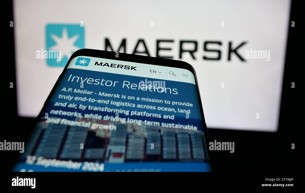 Smartphone with web page of Danish shipping company A.P. Moller ...