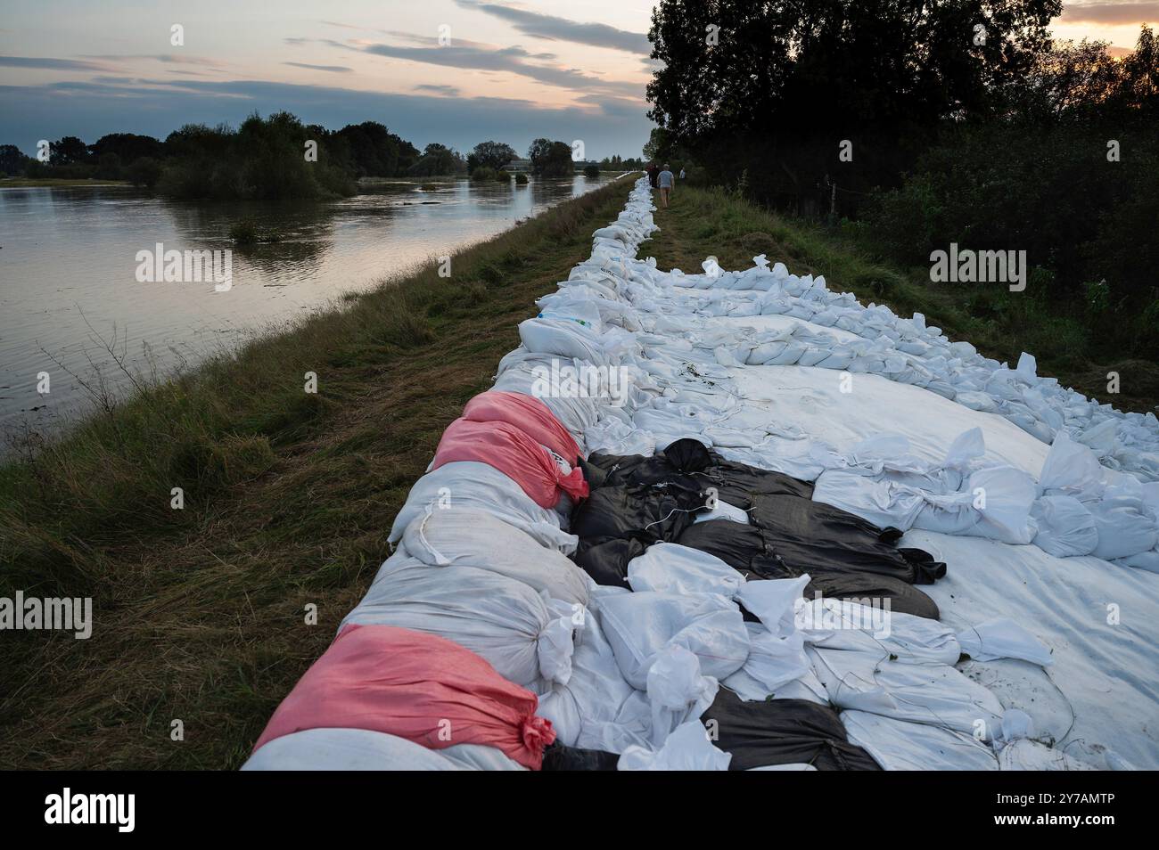 Reinforcement of river embankments with sandbags, flood risk in Poland ...