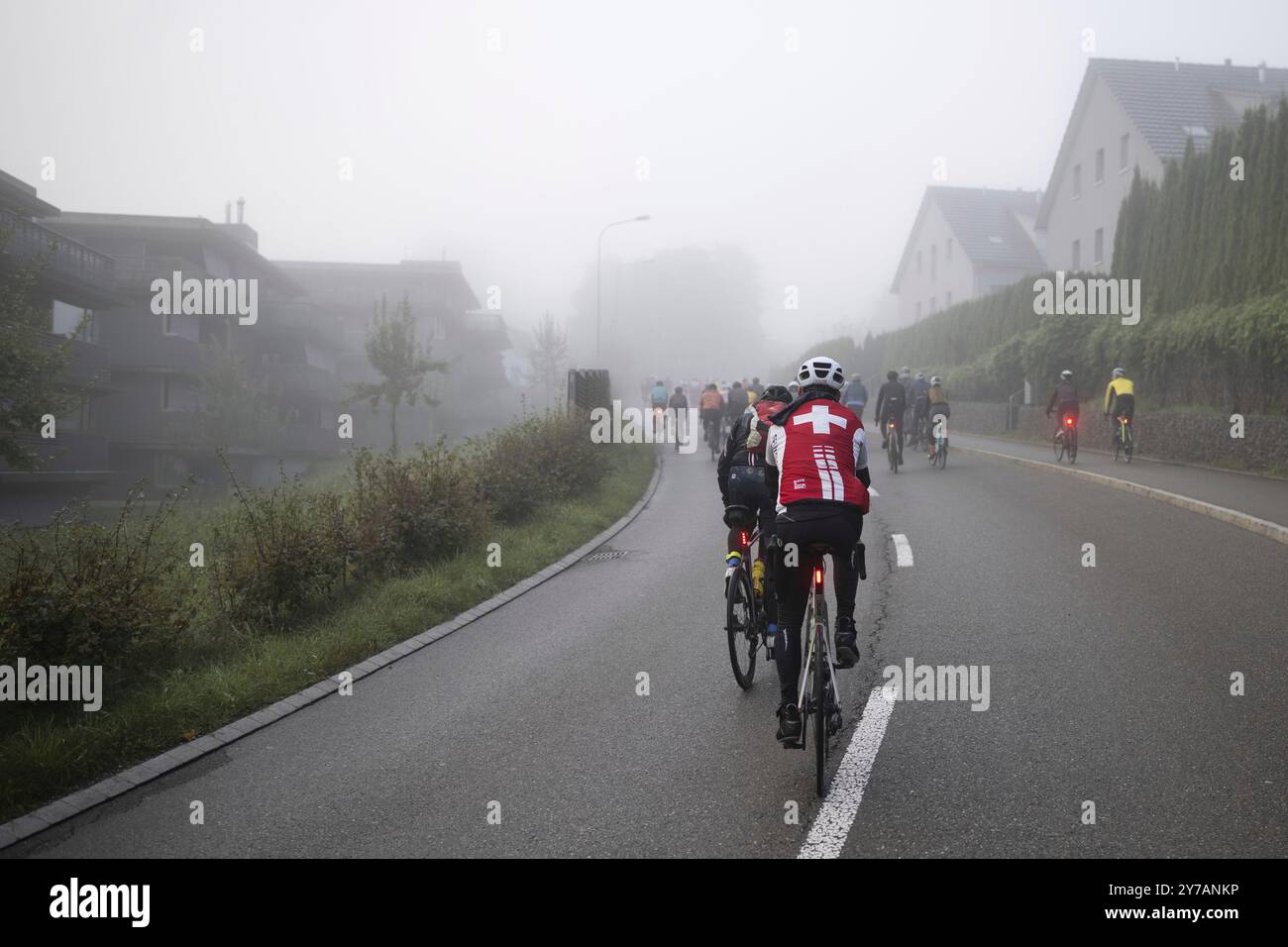 Cyclists attend a memorial ride to honor Switzerland's Muriel Furrer ...