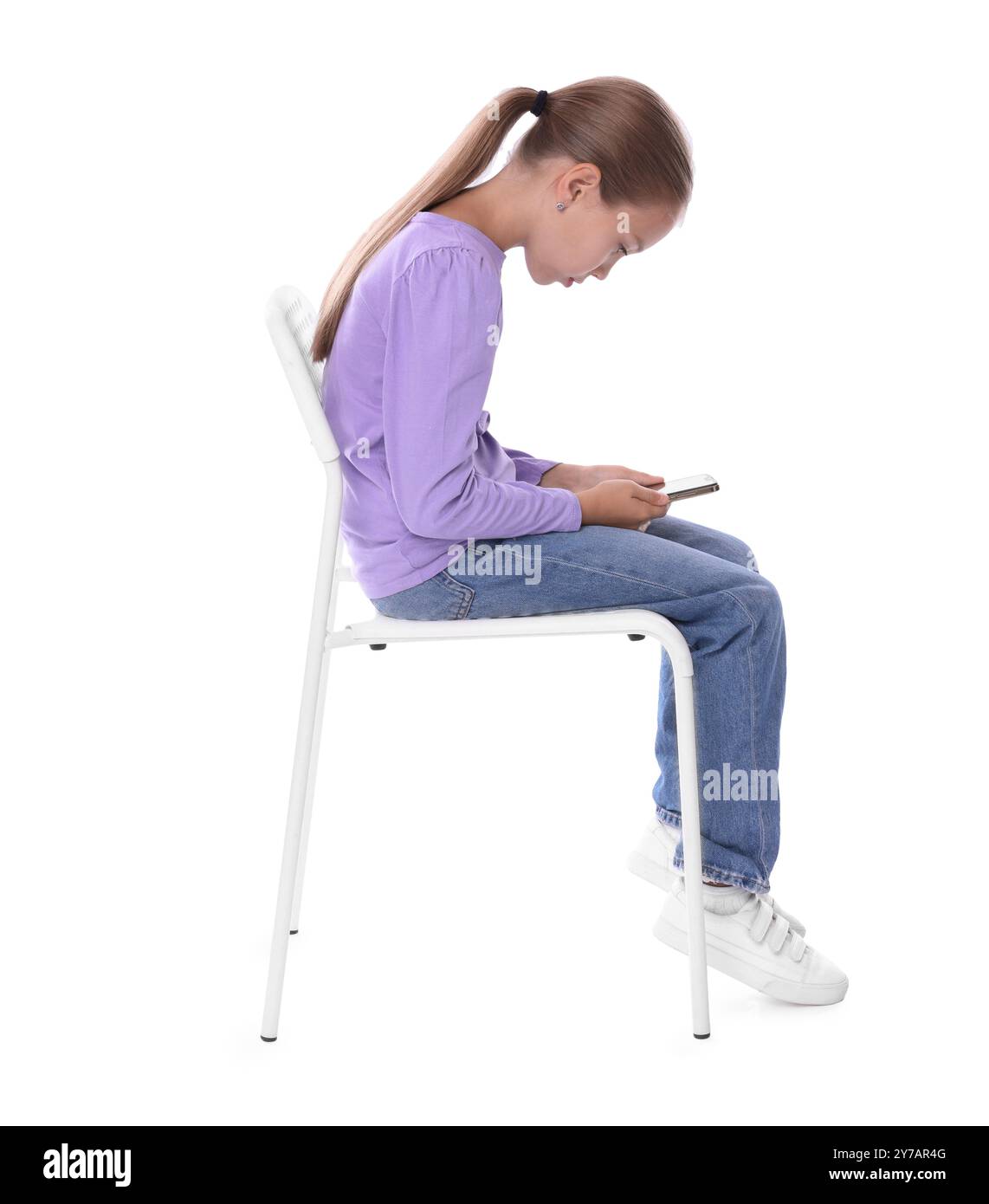 Girl with incorrect posture and smartphone sitting on white background ...