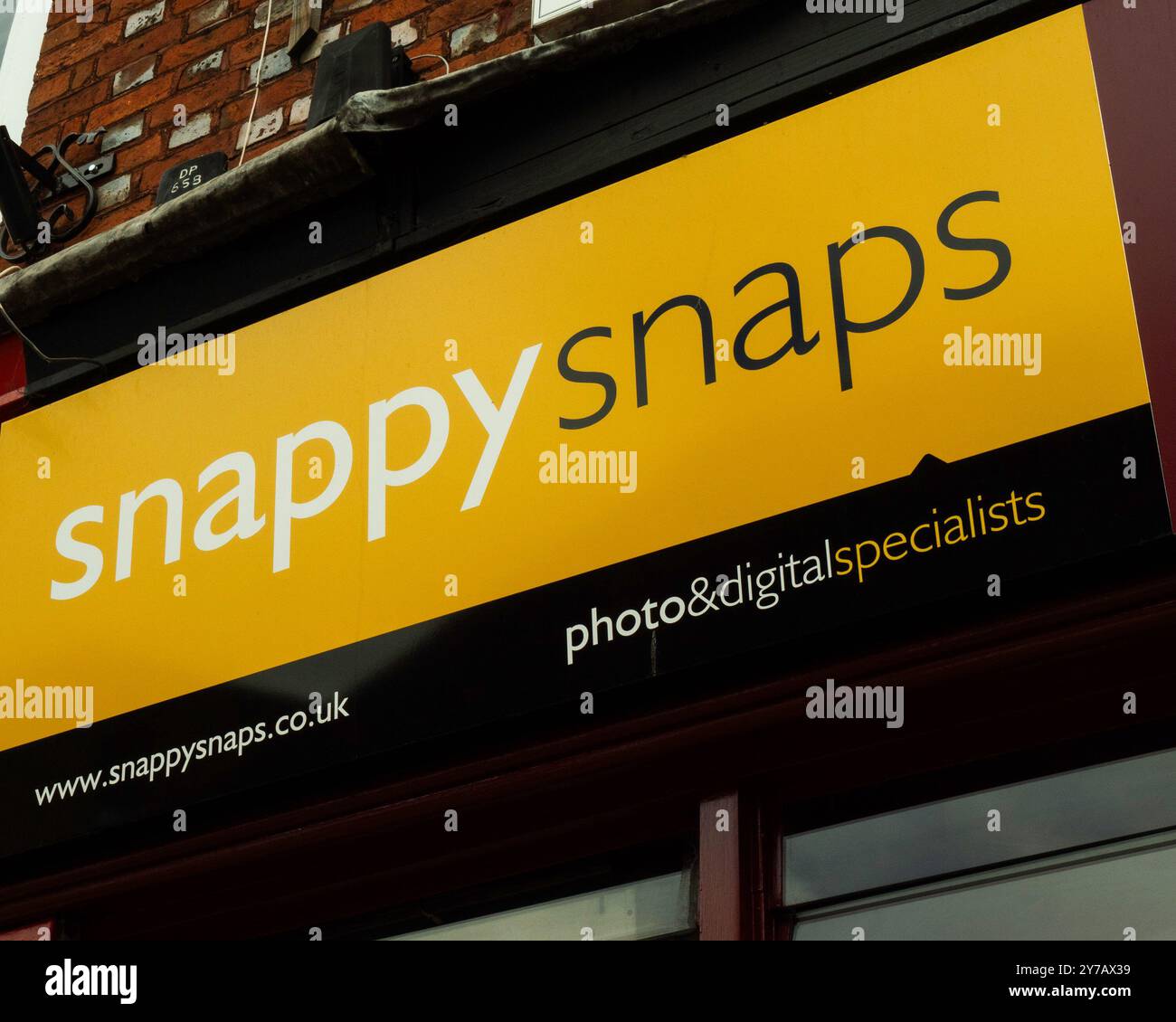 Snappy Snaps sign Stock Photo - Alamy