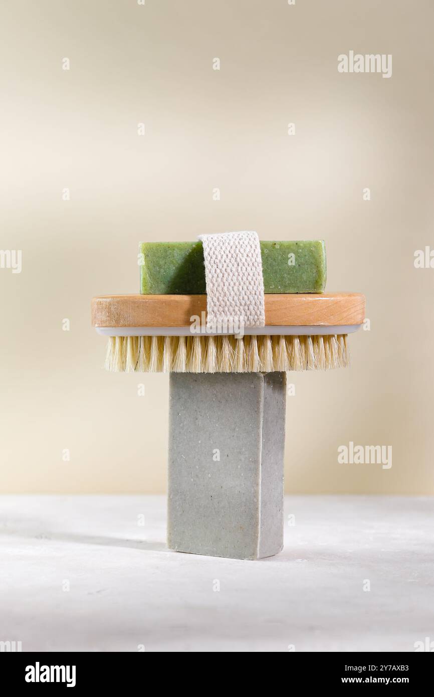 Minimalist still life with natural handmade soap and massage sponge ...