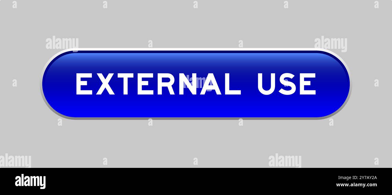 Blue color capsule shape button with word external use on gray ...