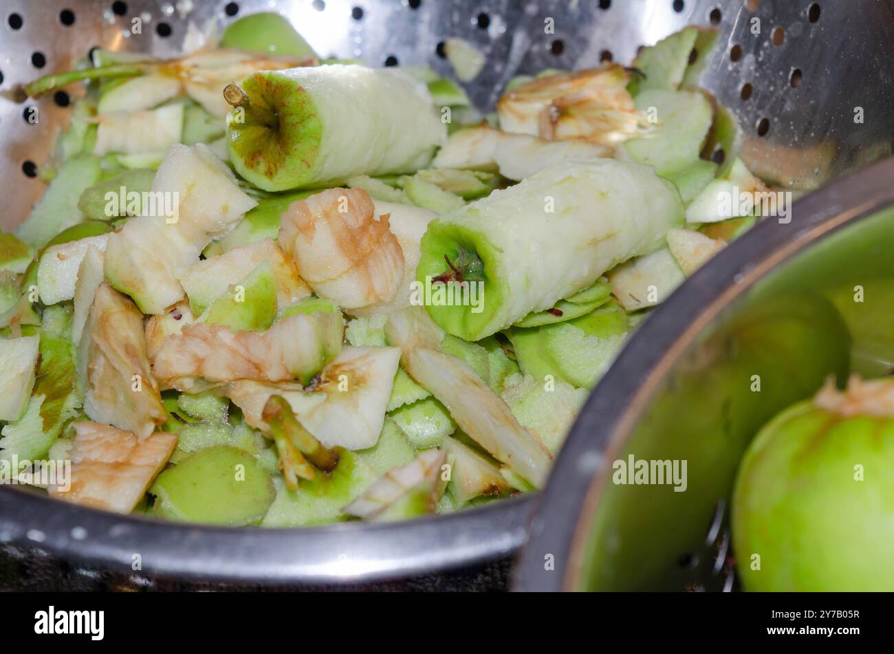 Apple skins and cores in a collander ready for the compost Stock Photo ...