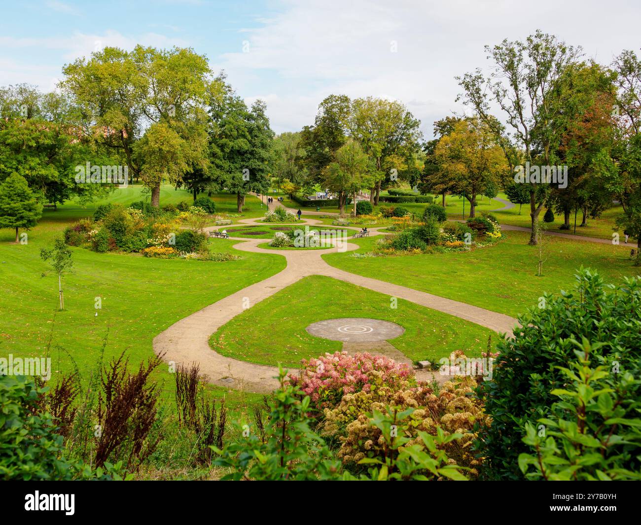 Peel park Salford. Beautiful garden park with winding pathways, lush ...