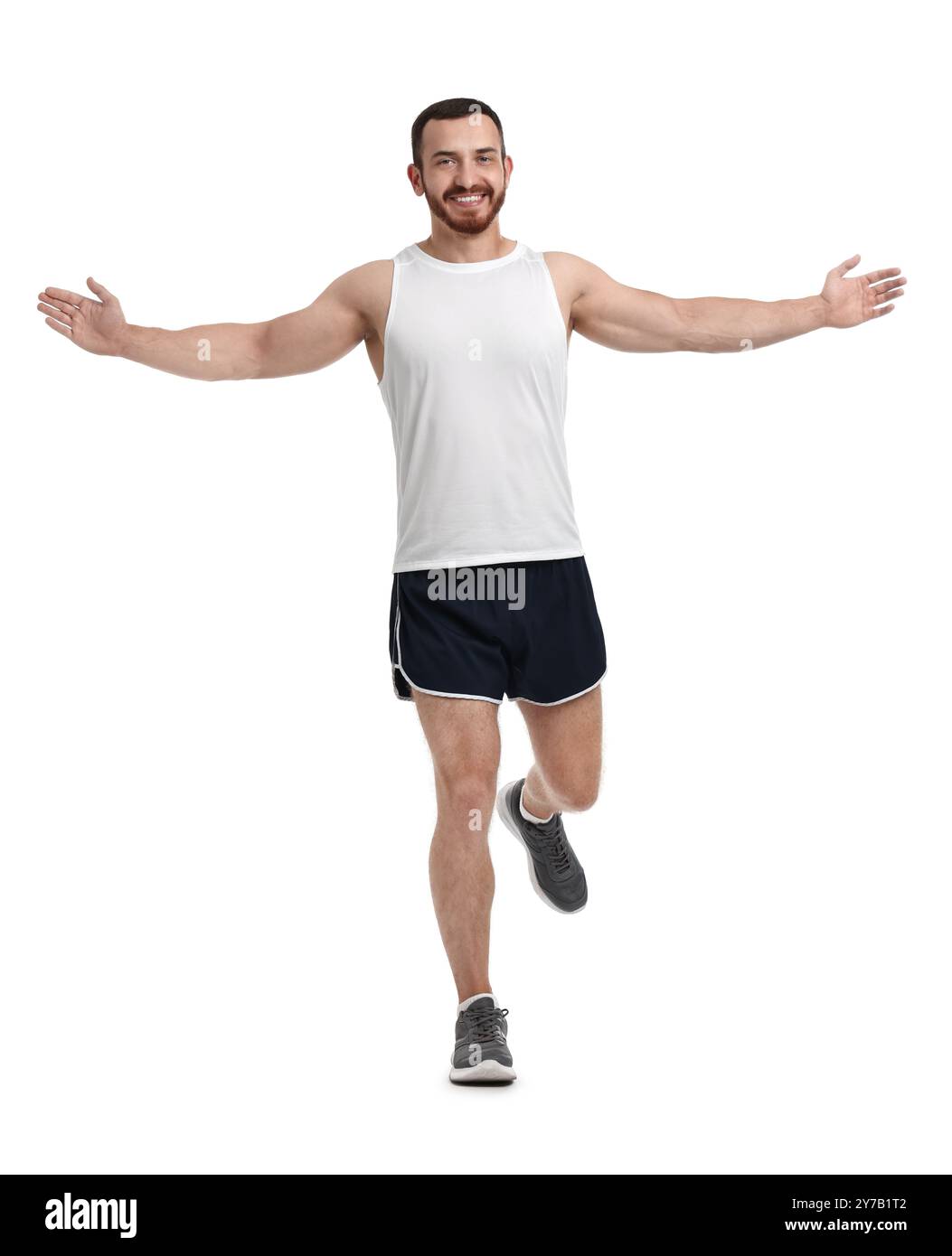 Handsome young man running on white background Stock Photo - Alamy