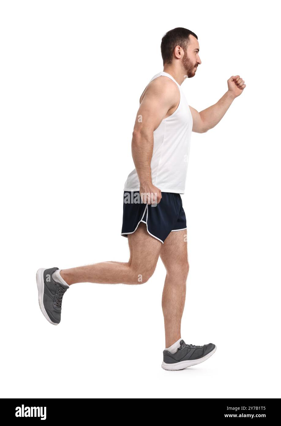 Handsome young man running on white background Stock Photo - Alamy