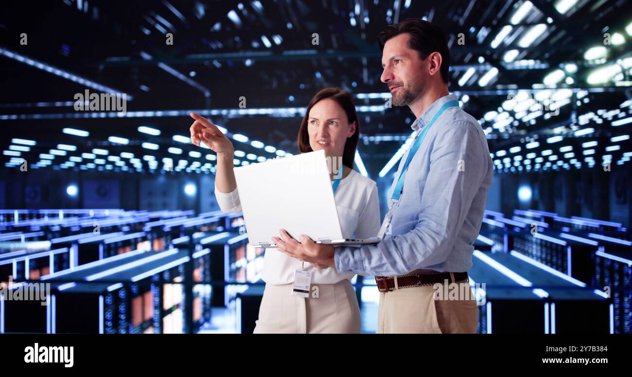 Server Room In Data Center. Cloud Computer Engineers Configuring AI Technology Stock Photo - Alamy