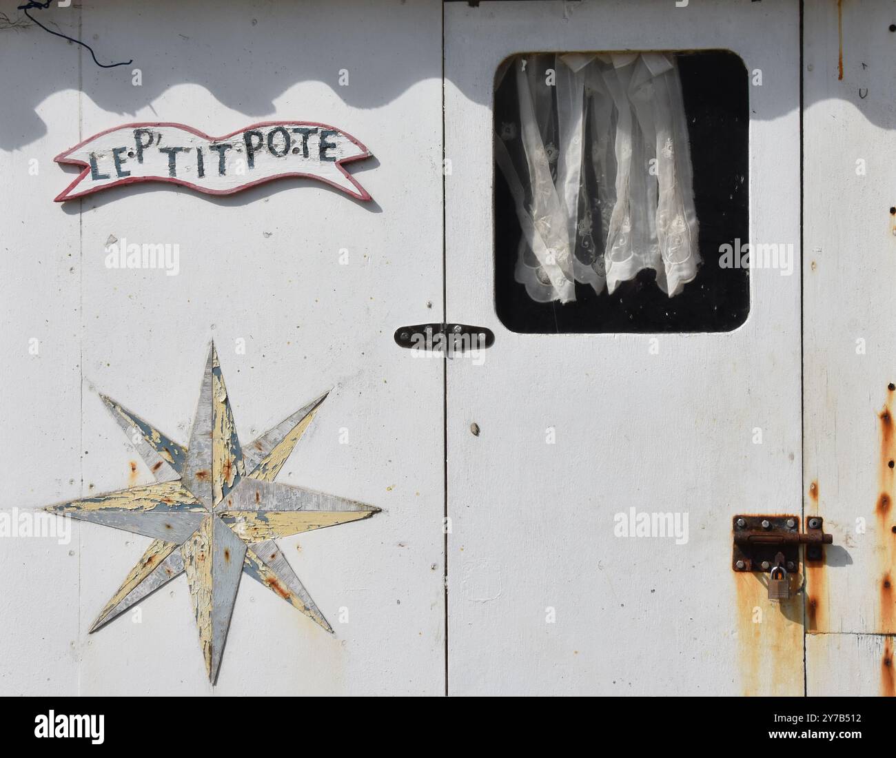 the little friend, Inscription on the doors of the huts of Port La ...