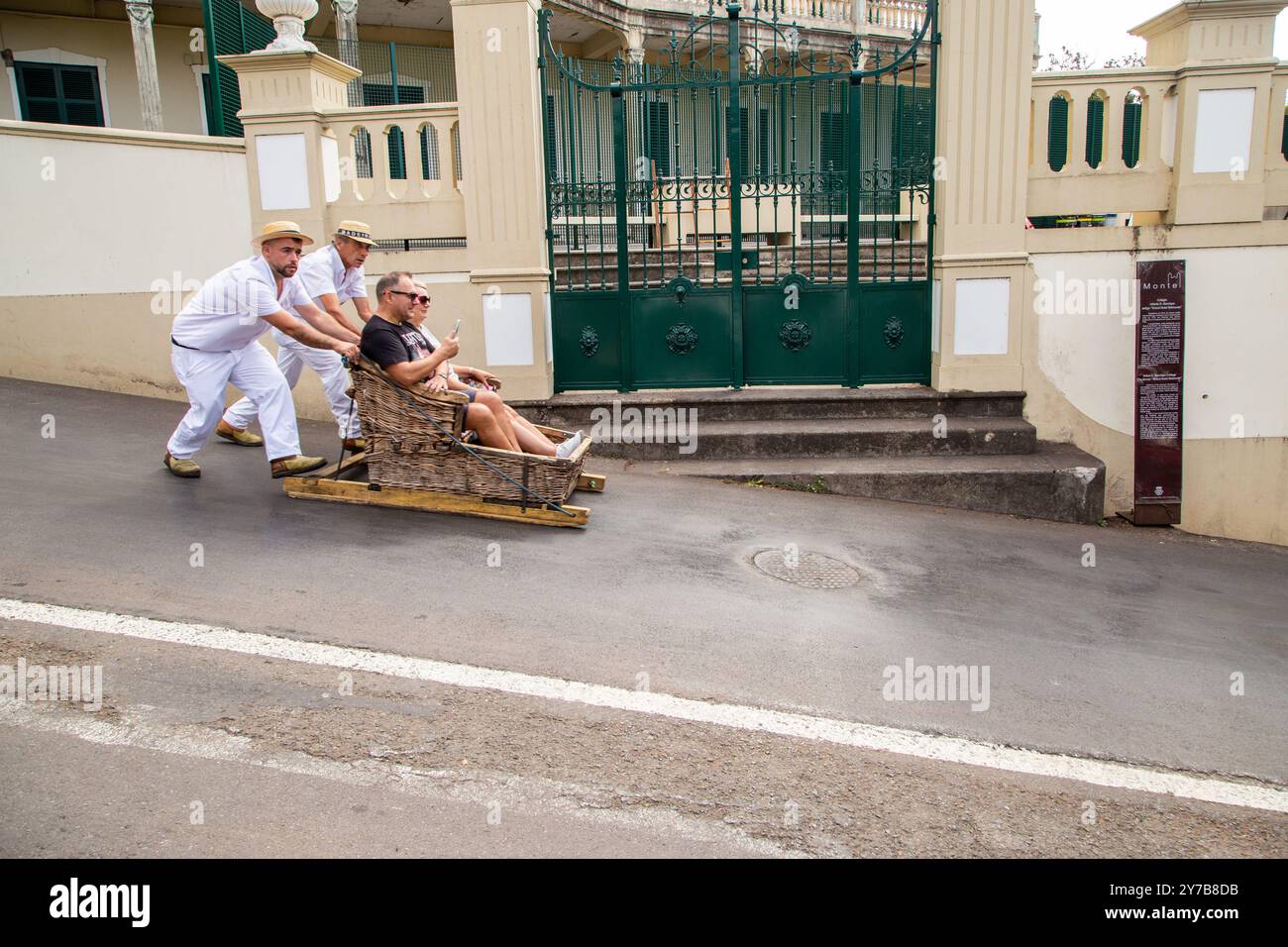 Holidaymakers and tourists having fun taking a ride in traditional ...