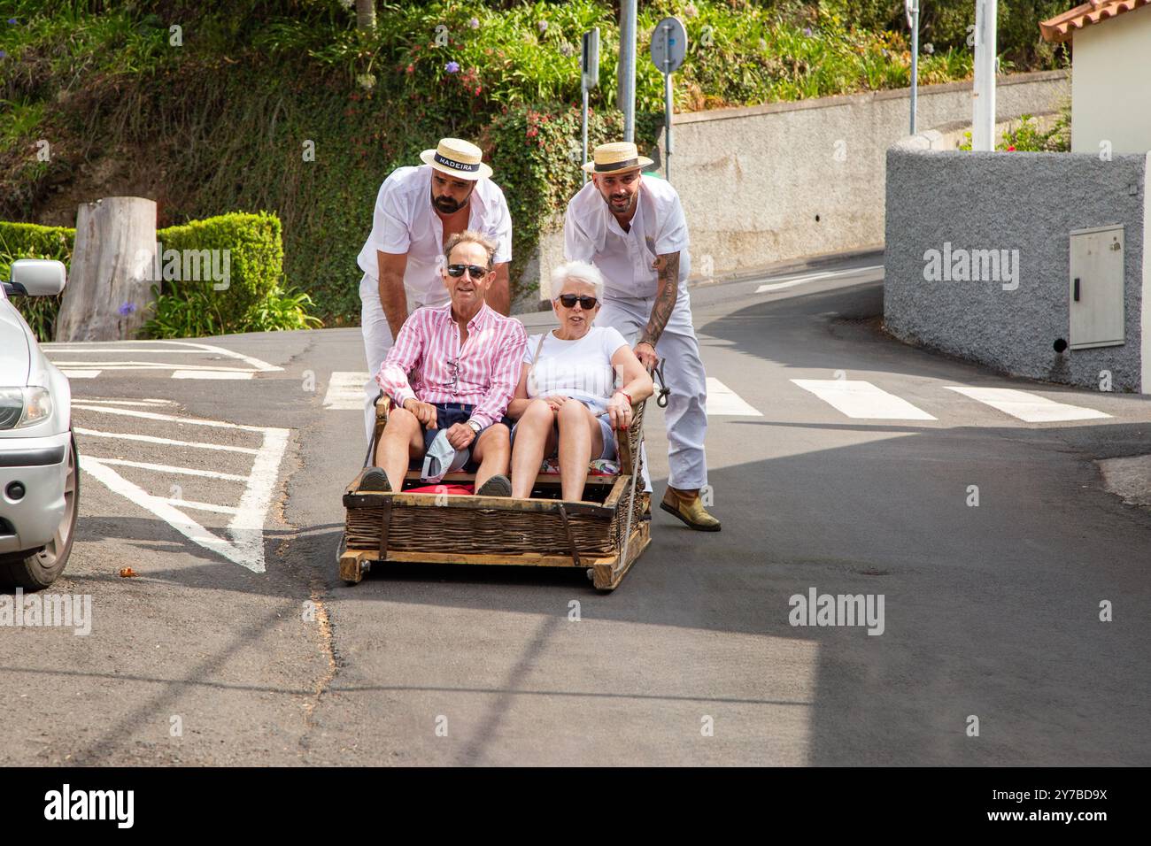 Holidaymakers and tourists having fun taking a ride in traditional ...