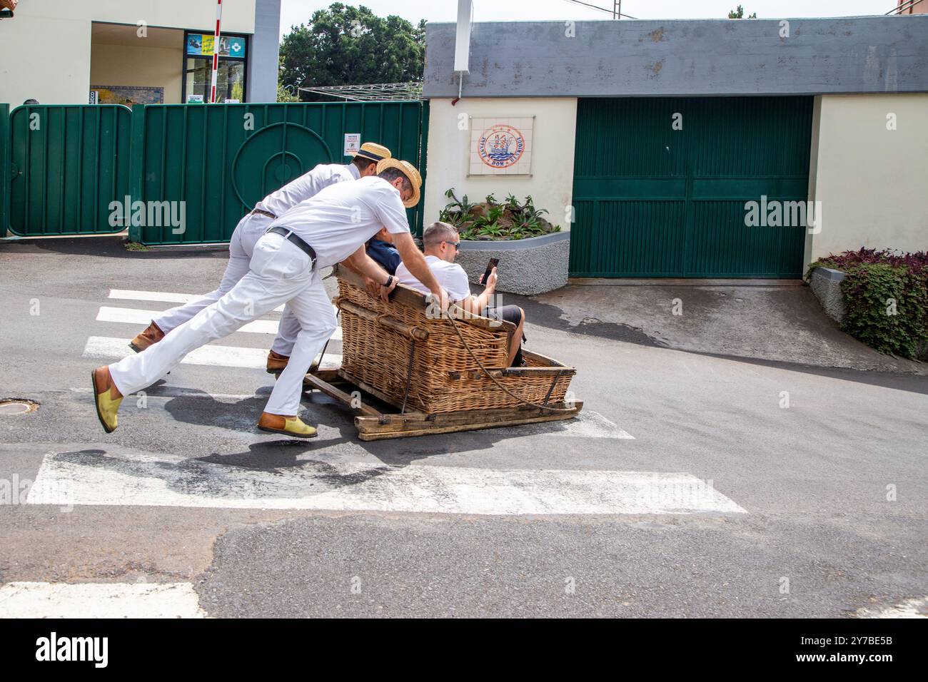 Holidaymakers and tourists having fun taking a ride in traditional ...