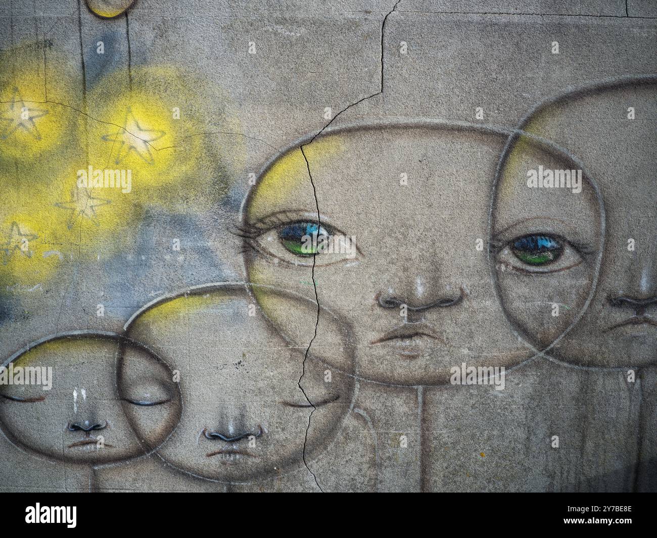 Plymouth Graffiti artwork of beautiful alien faces Stock Photo - Alamy