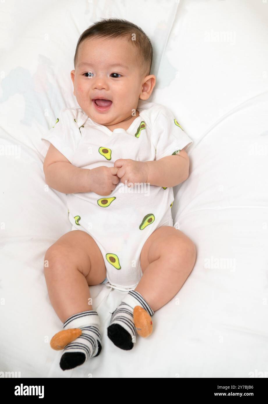 Happy smiling of adorable Asian baby boy on white bed, happy healthy ...