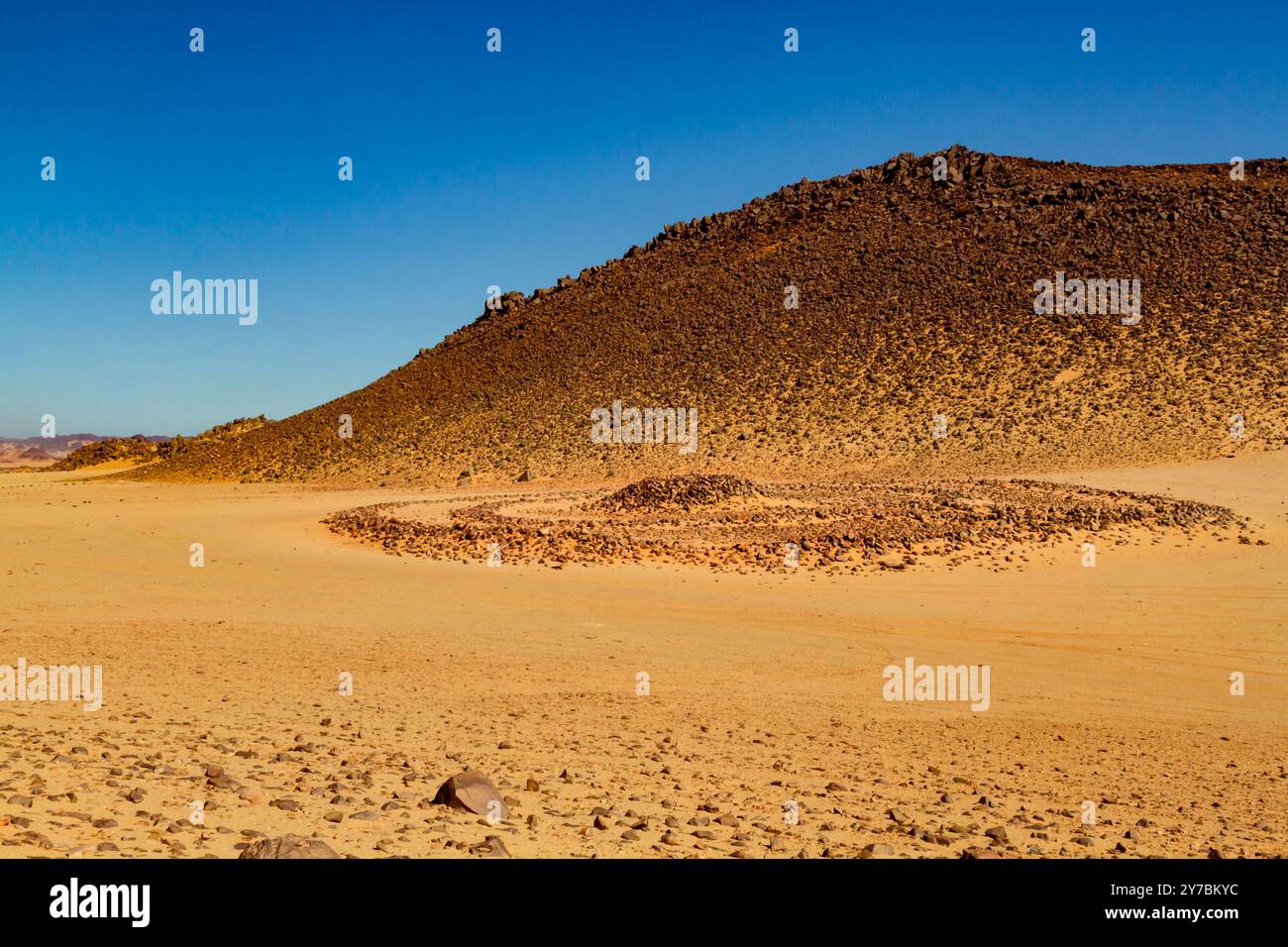 Historic grave. A pre-Islamic historic circular stony burial mound ...