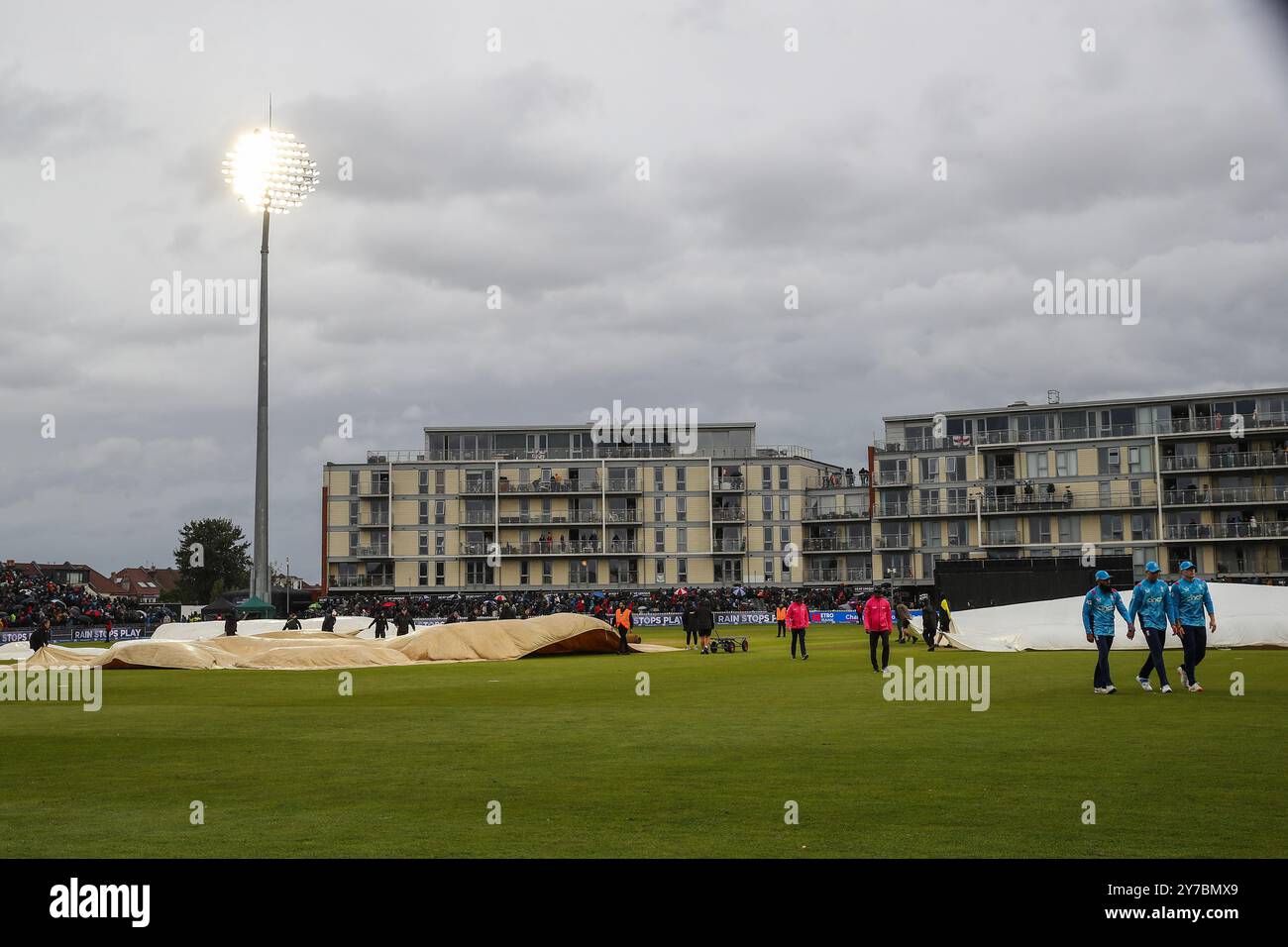 The rain covers on due to heavy rain during the Fifth Metro Bank One ...
