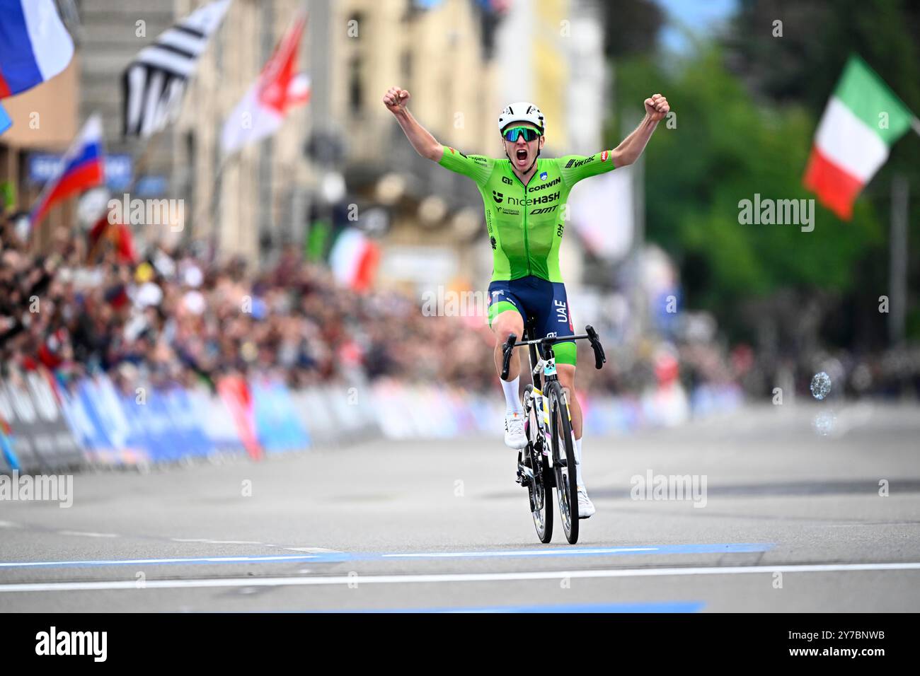 Switzerland. 29th Sep, 2024. Slovenian Tadej Pogacar and pictured passing the finish line of the ...