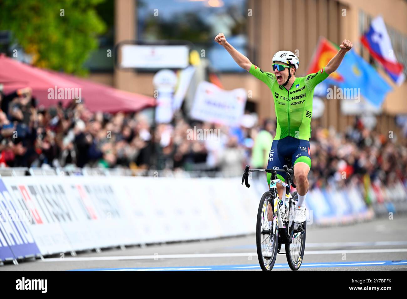 Switzerland. 29th Sep, 2024. Slovenian Tadej Pogacar and pictured passing the finish line of the ...
