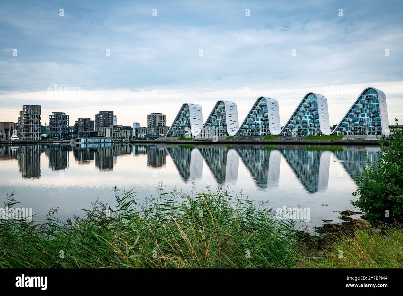 The wave boelgen iconic modern apartments in Vejle, Denmark with ...