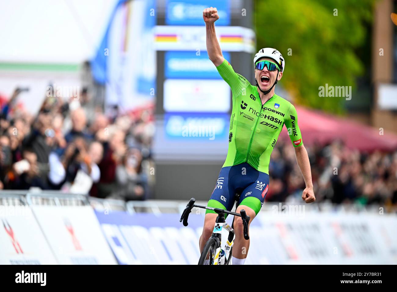 Switzerland. 29th Sep, 2024. Slovenian Tadej Pogacar and pictured passing the finish line of the ...