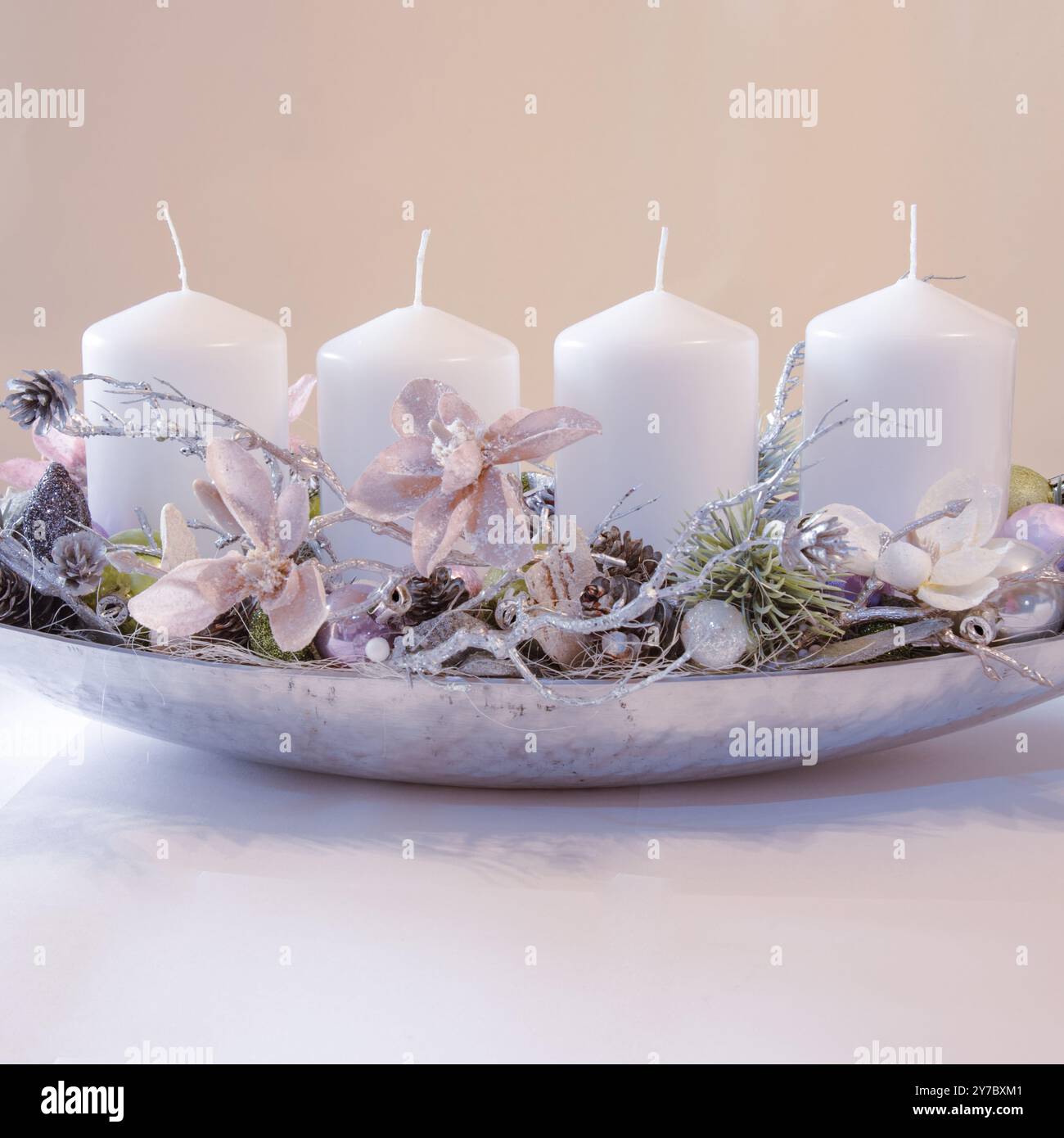 four white advent candles not lit, without flame, on white background ...
