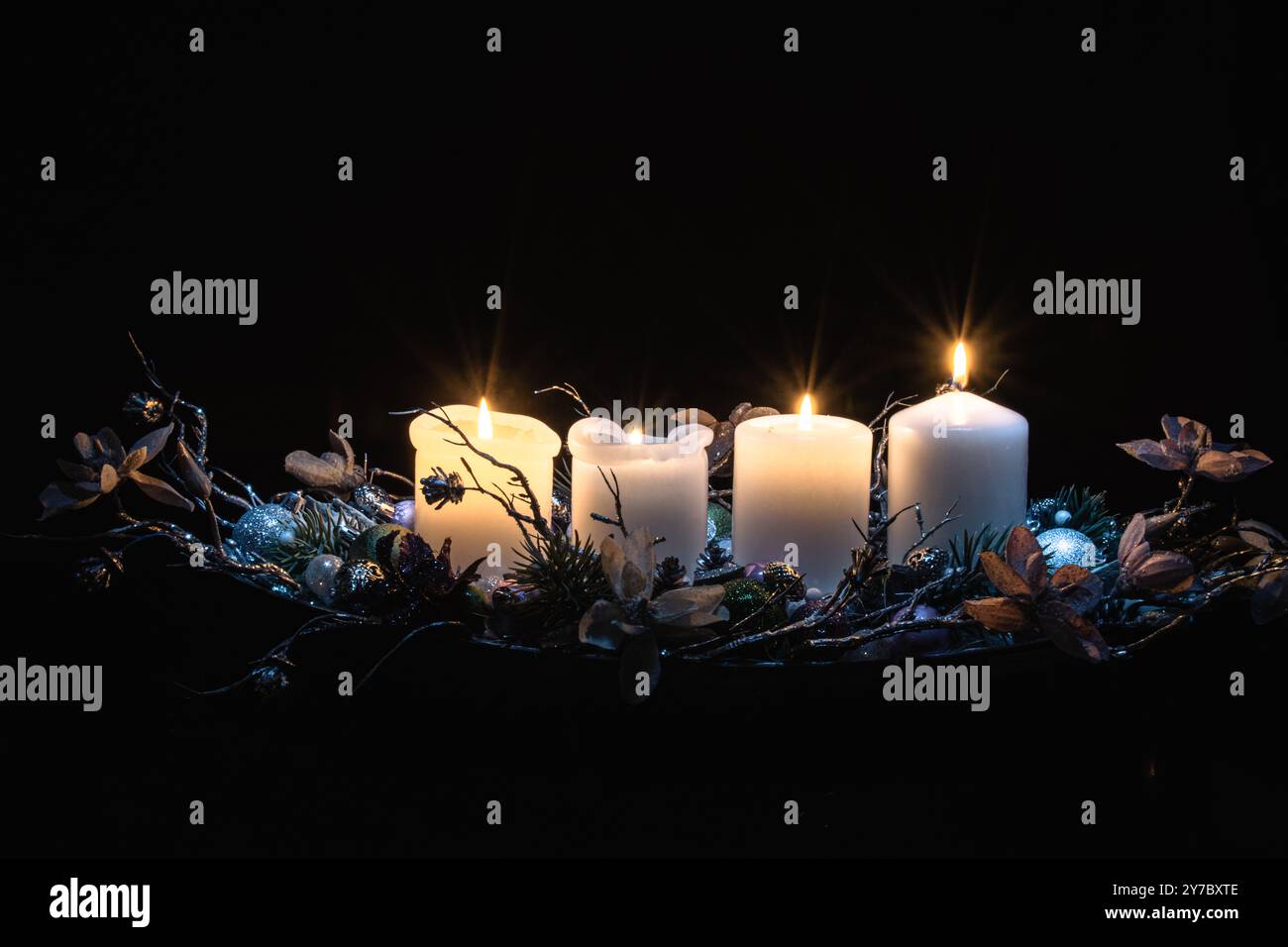 four white advent candles, four advent candles with light, simple image ...