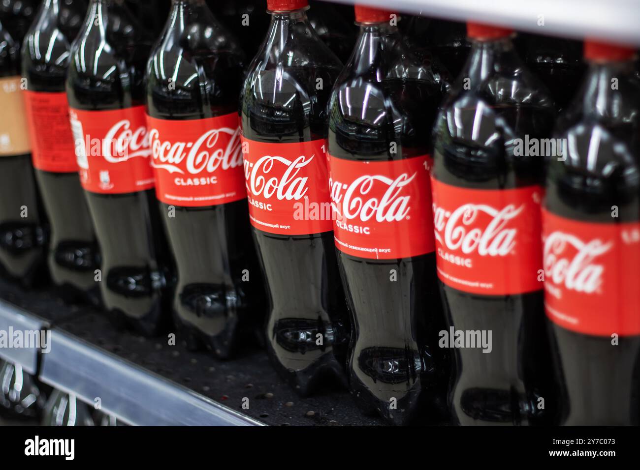 Belarus, Minsk - 30 april, 2024: A neat row of several CocaCola bottles ...