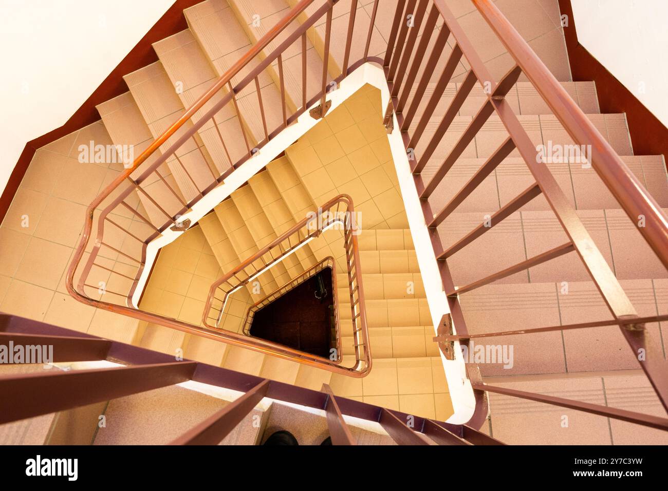 A staircase forms several triangles from top to bottom Stock Photo - Alamy