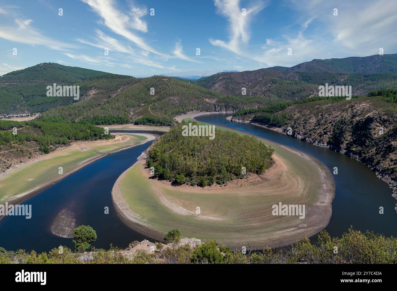 View of the Melendo Meander of the Alagon River with forests and hills ...