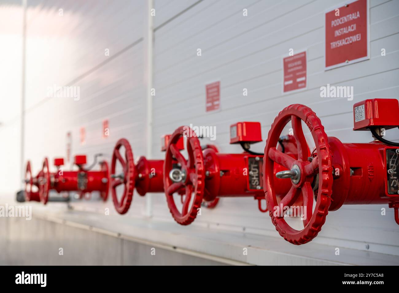 Close up photograph of sprinkler system exterior control valves located ...
