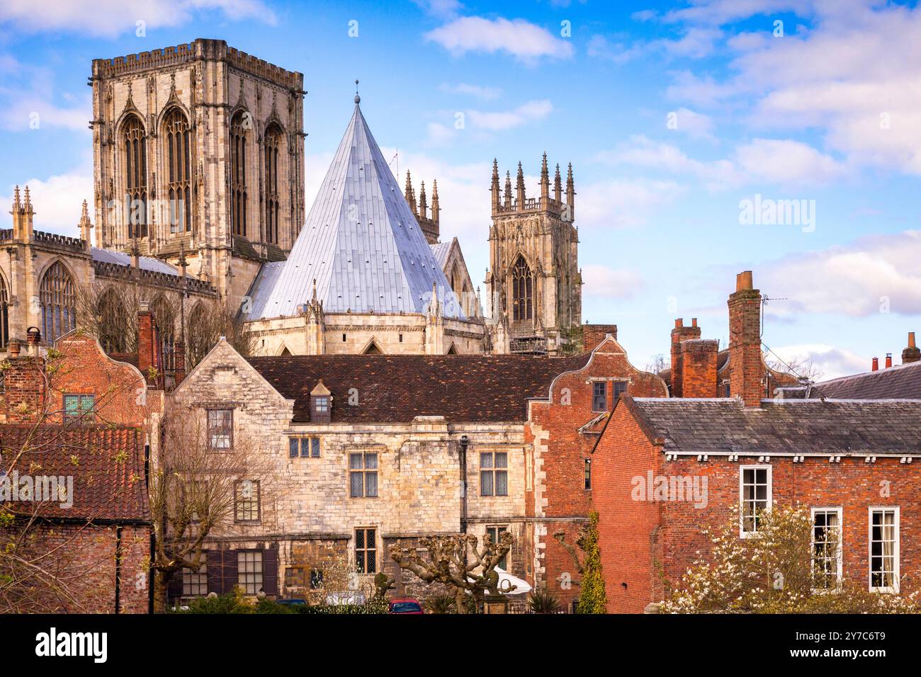 View over roof tops to York Minster, from the city walls, York, North ...