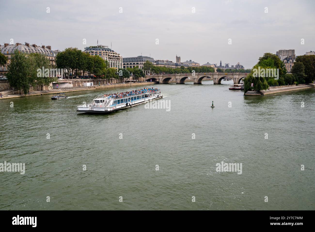 Paris, France August 15 2024 tourist ferry on River Seine in the city ...