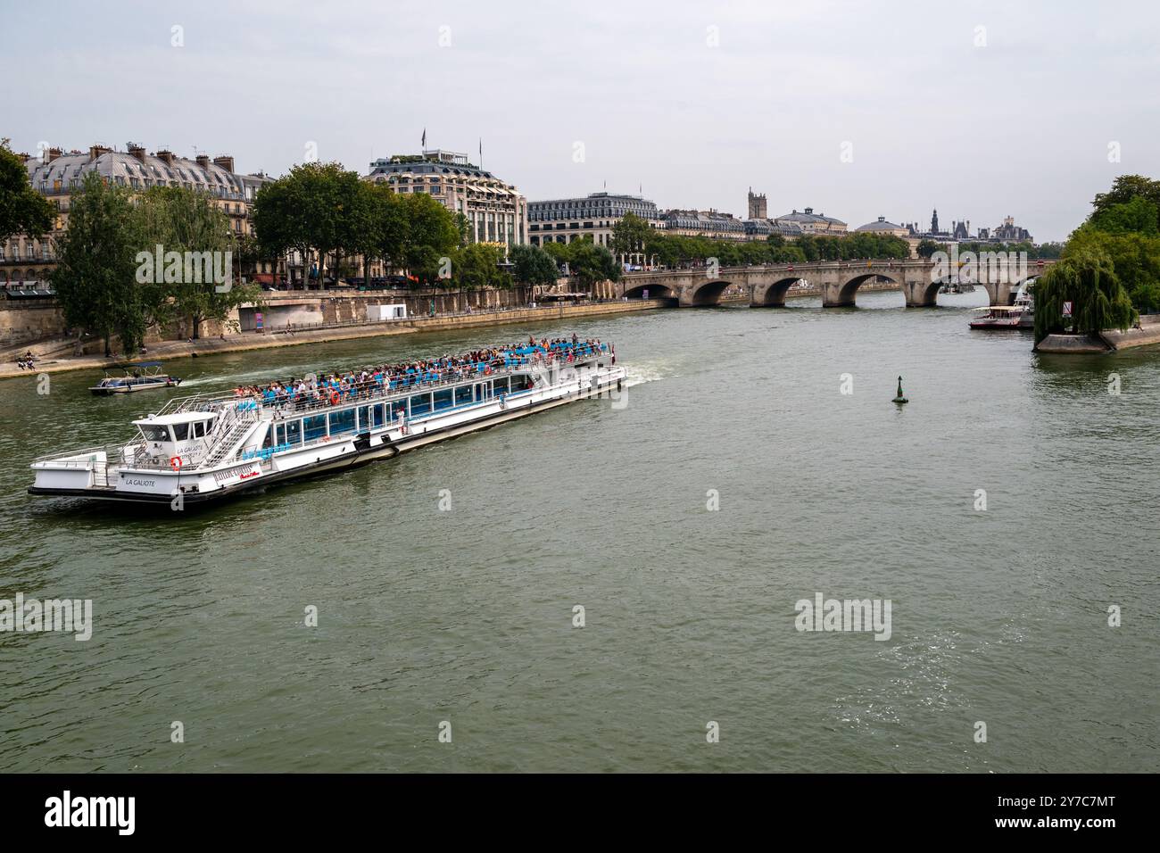 Paris, France August 15 2024 tourist ferry on River Seine in the city ...