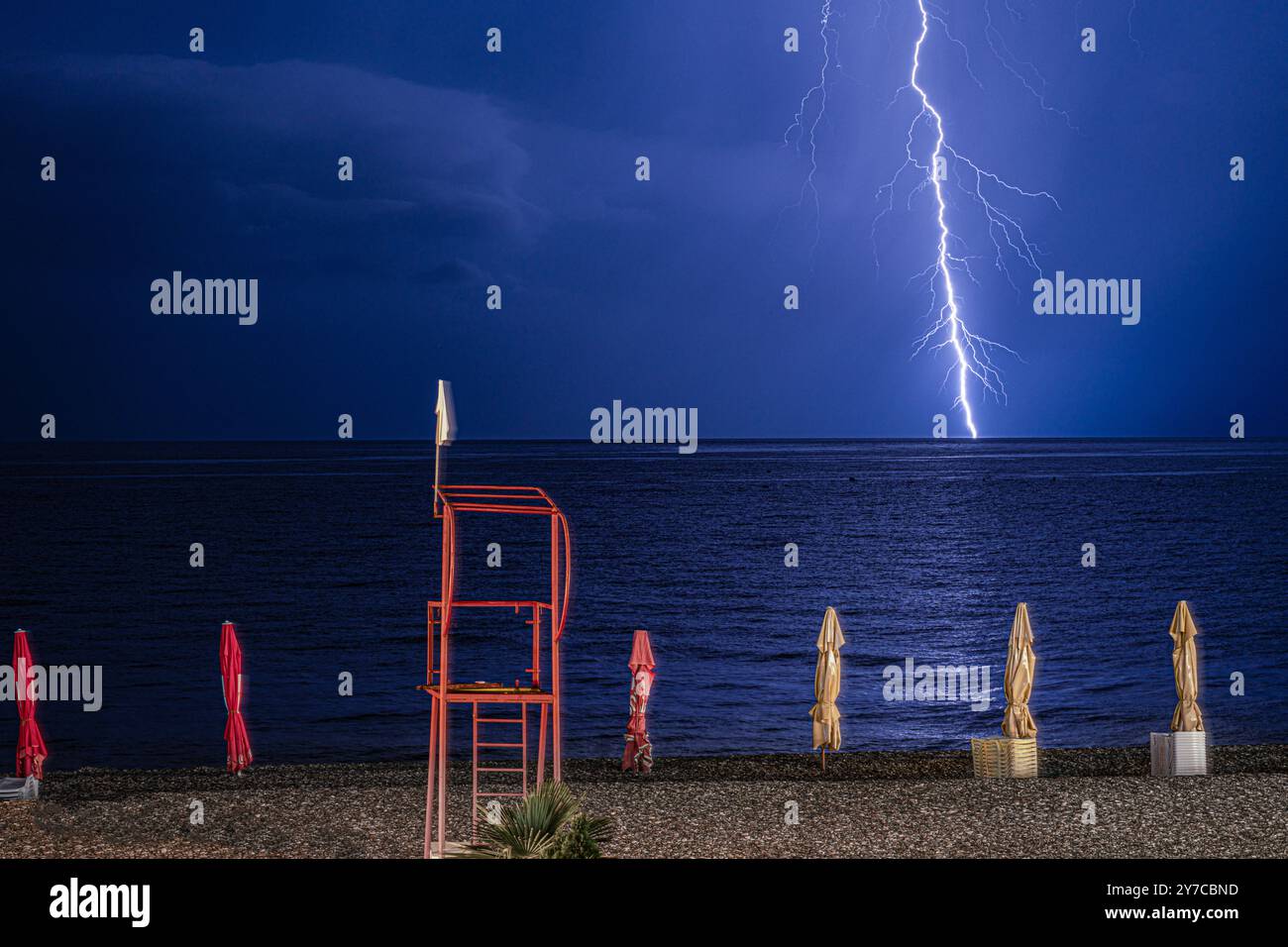 Dramatic flashlight in the night sky Stock Photo - Alamy