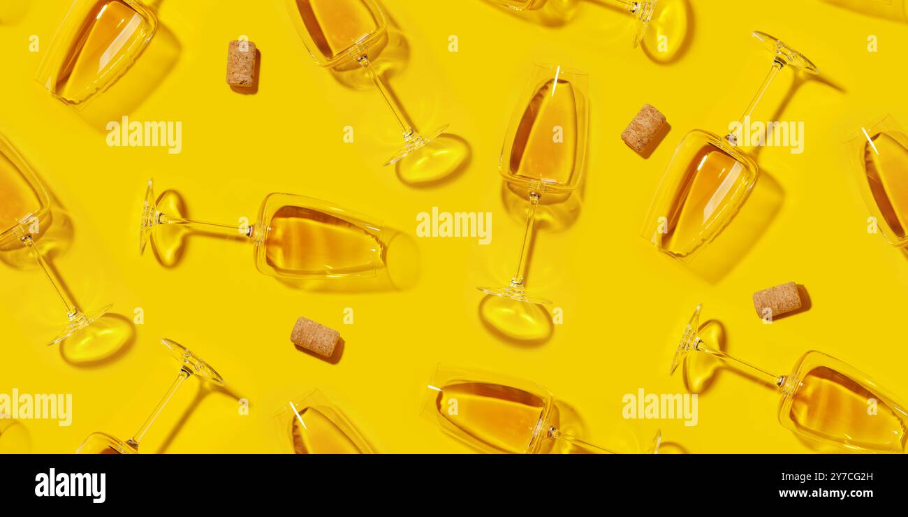 Seamless flat lay background with white wine glasses evenly arranged ...