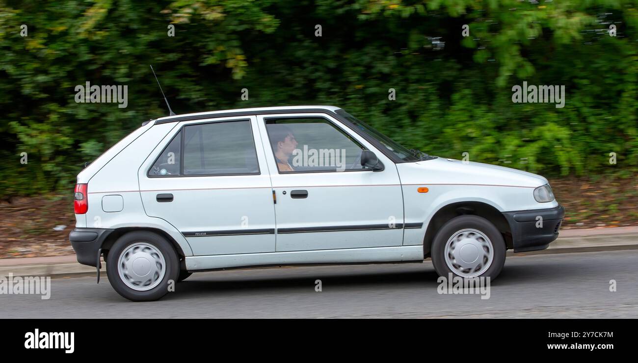 Milton Keynes,UK - Sept 29th 2024: 1996 white Skoda Felicia car driving ...