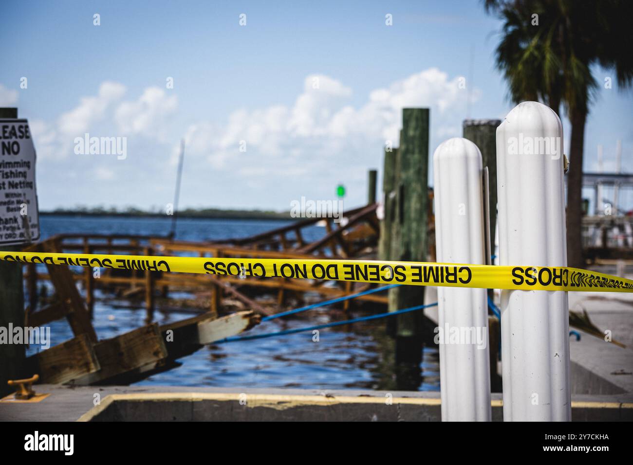 Dunedin, Florida, USA. 29th Sep, 2024. Crime scene tape covers sections ...