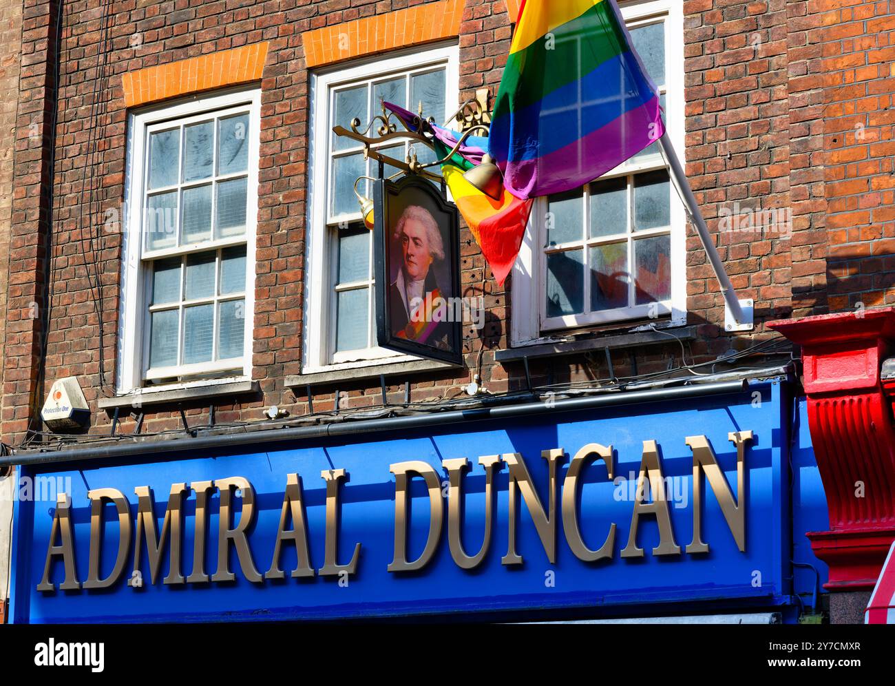 The Admiral Duncan pub sign and rainbow flag, Old Compton Street, in ...