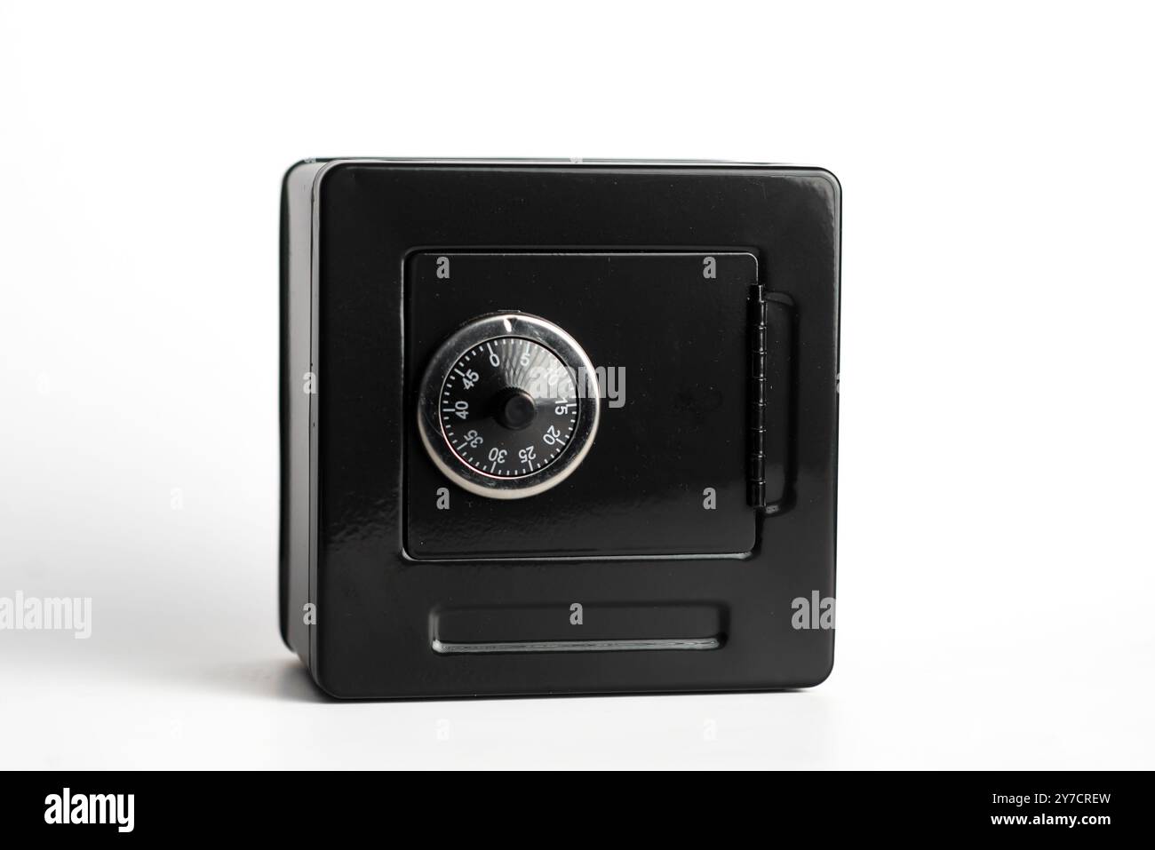 Black safe with combination lock on white background for security ...