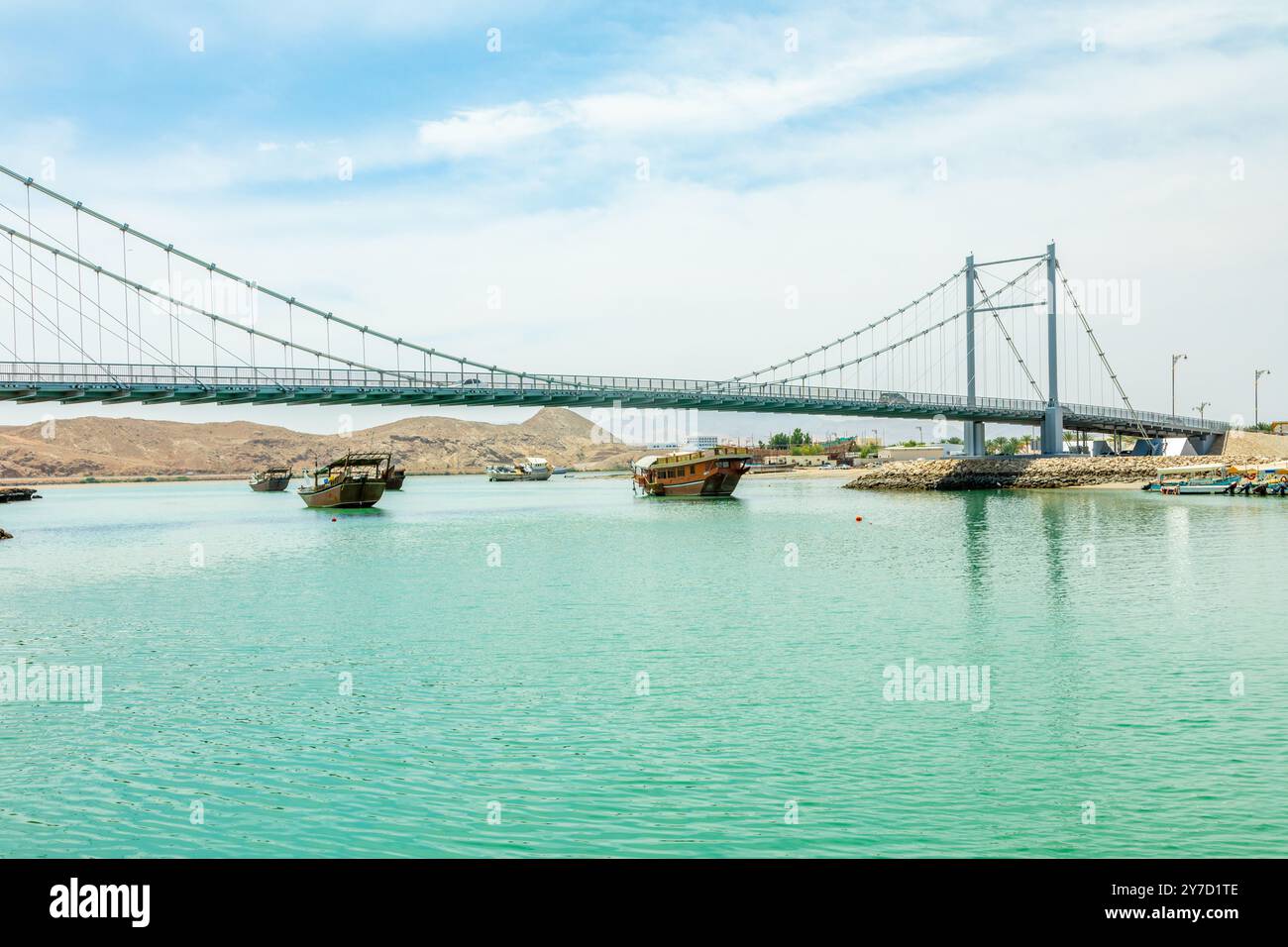 Traditional omani wooden dhow boats under Al Ayjah bridge, Sur ...