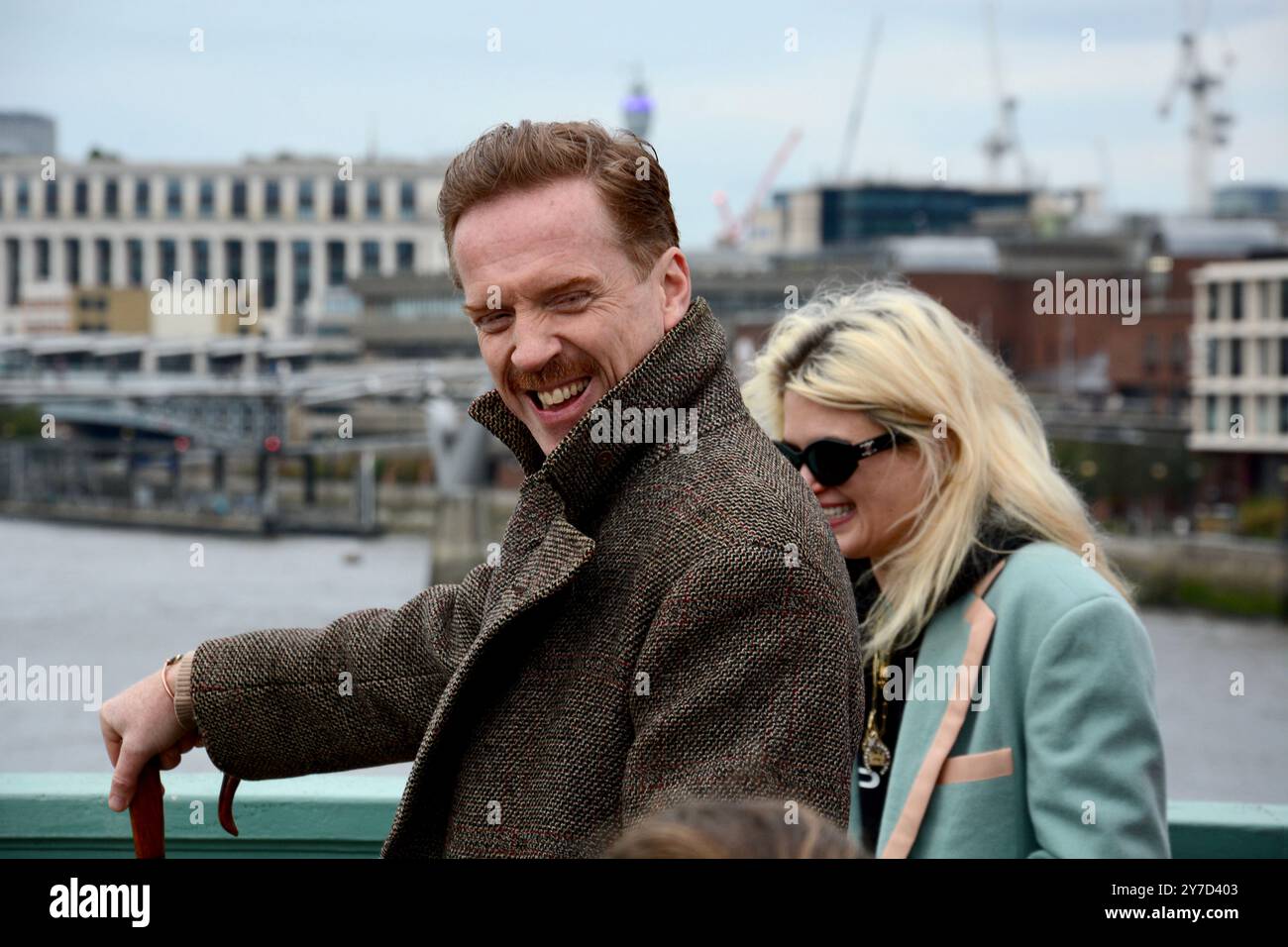 Damian Lewis shepherds sheep across Southwark Bridge in London as a ...