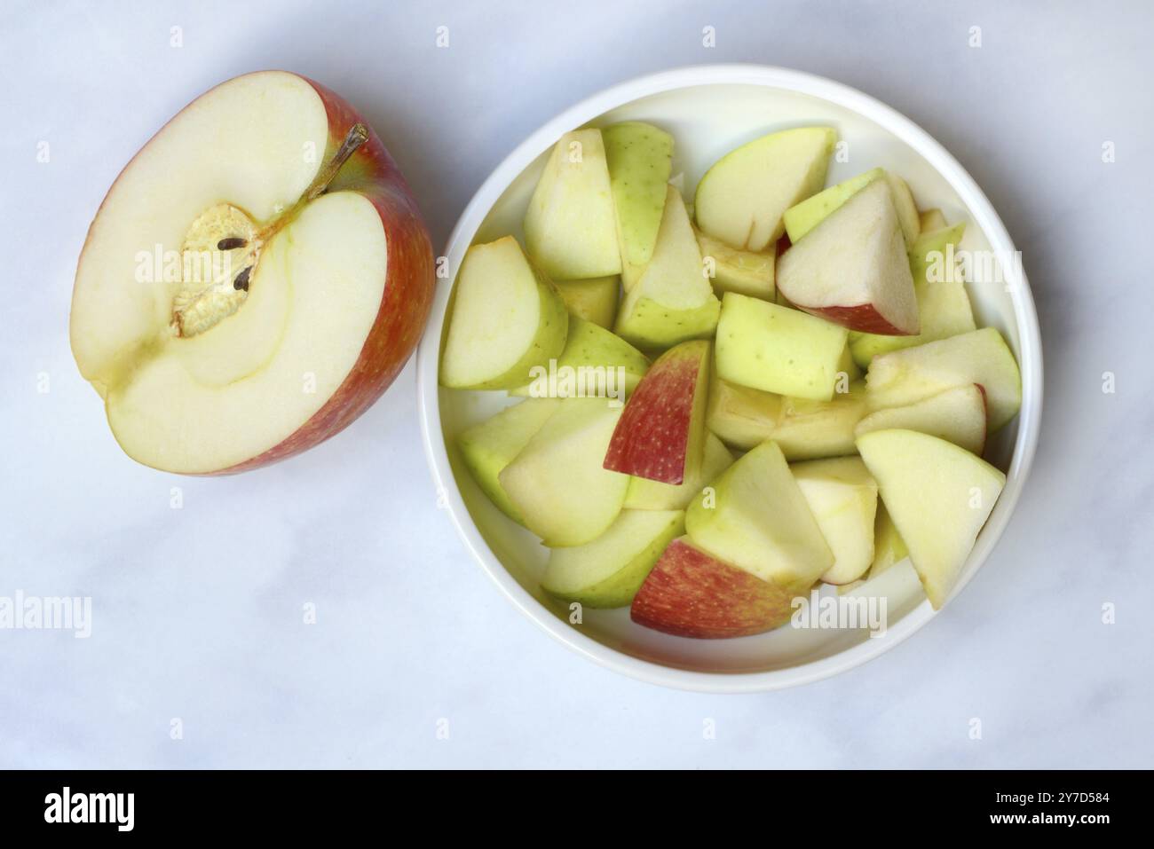 Apple pieces in skin, apple, malus Stock Photo - Alamy