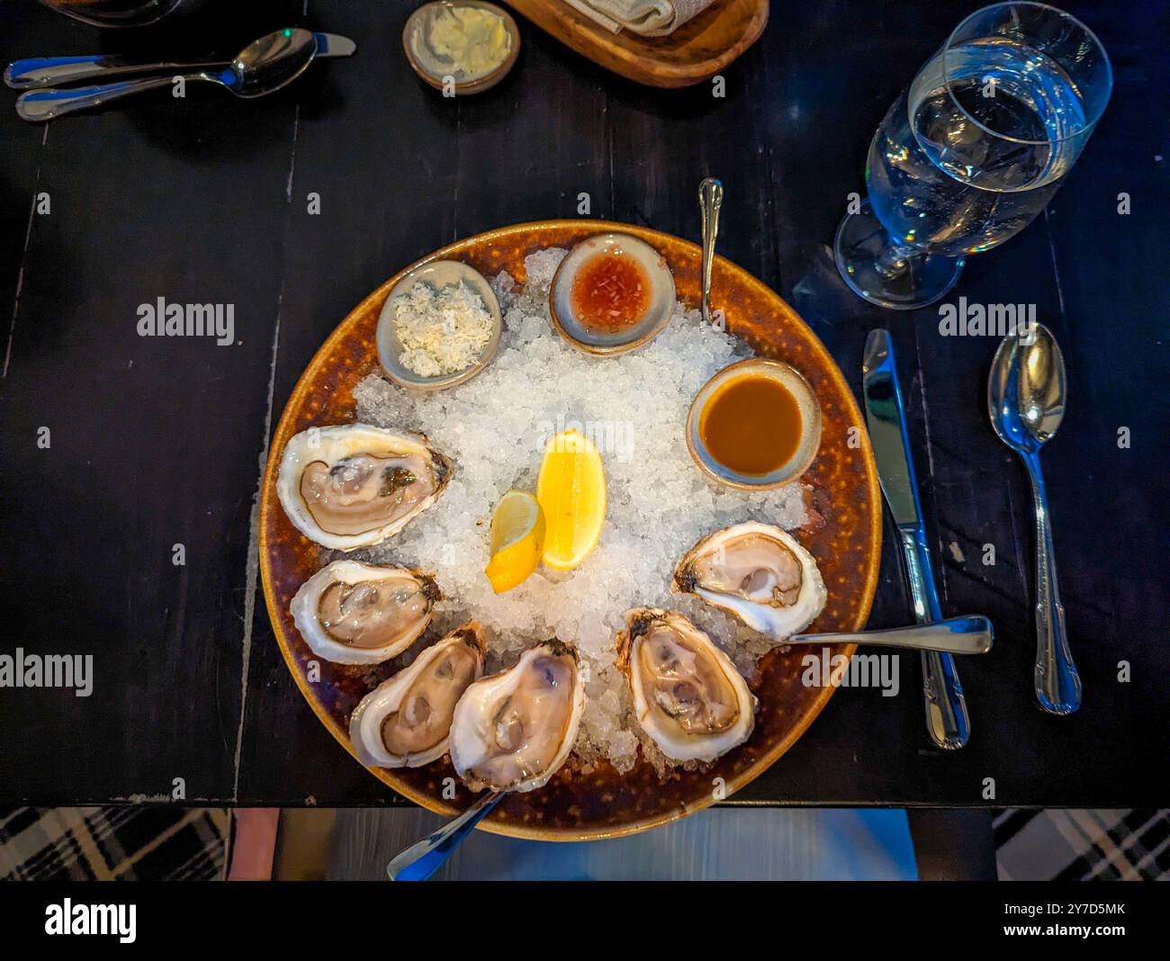 Hot oysters butter lemon hi-res stock photography and images - Alamy