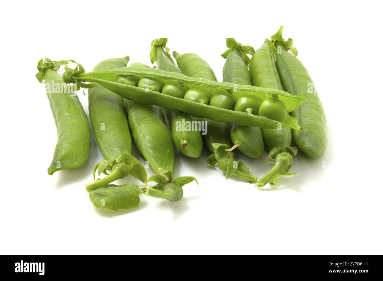 Sweet pea pods. Young peas isolated on white background. Fresh and ...