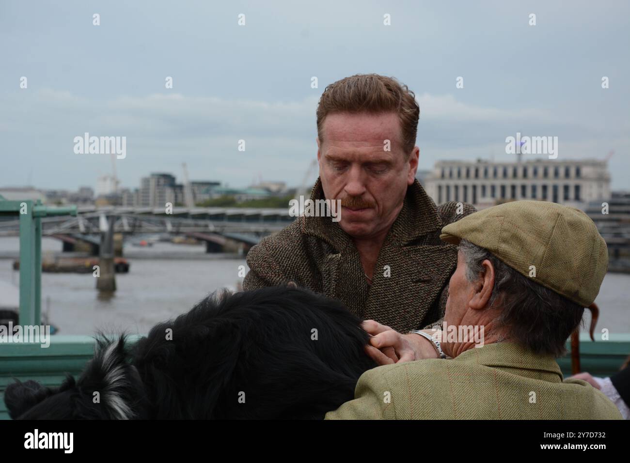 Damian Lewis shepherds sheep across Southwark Bridge in London as a ...