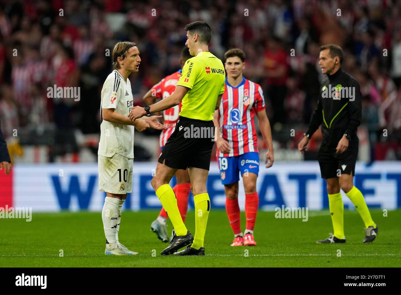Madrid, Spain. 29th Sep, 2024. Referee Mateo Busquets Ferrer and Luka ...