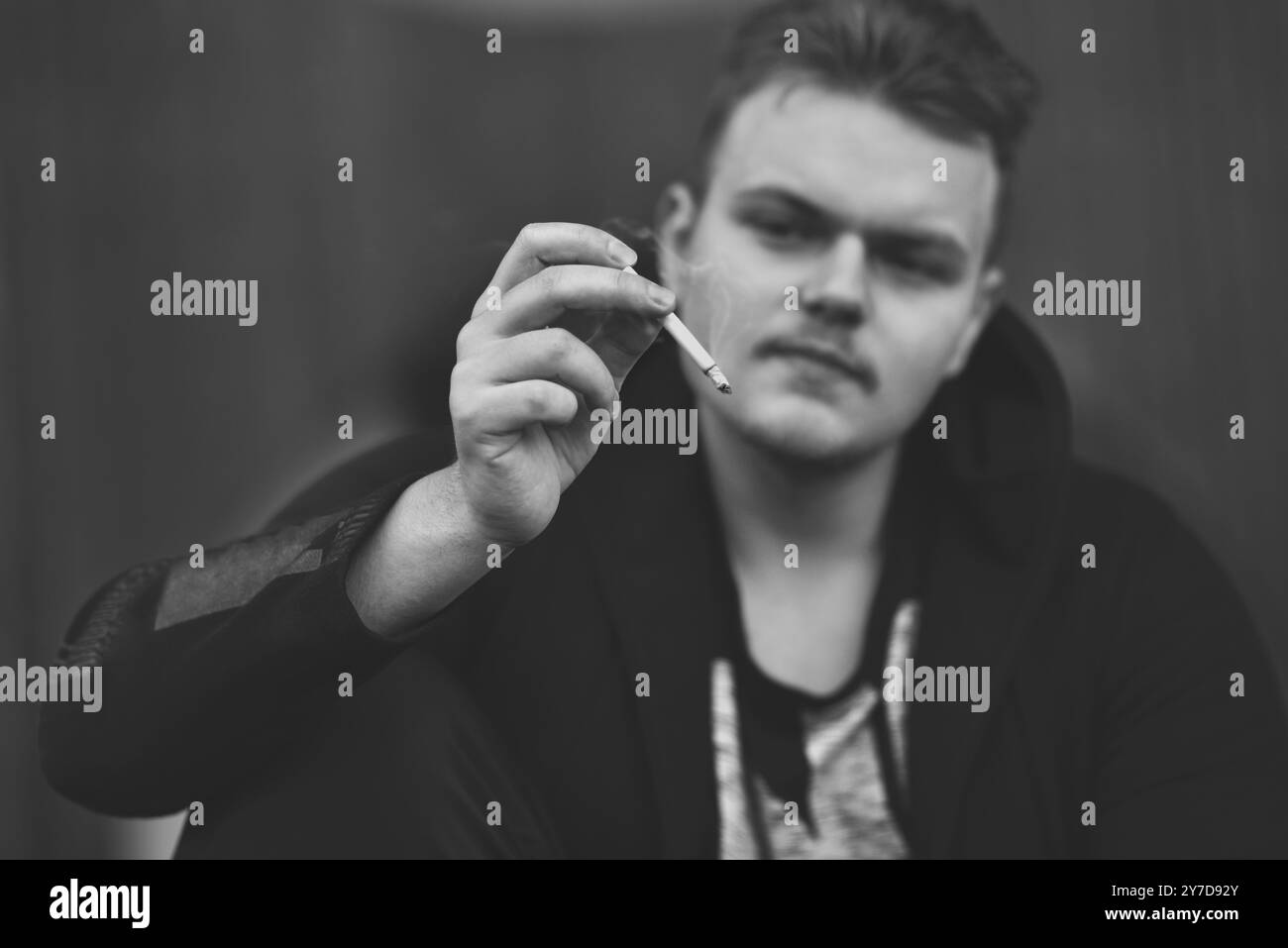 Man smoking cigarette, Close up of an smoking cigarette Stock Photo - Alamy