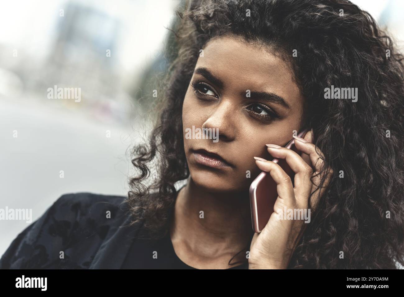 Sad woman walking and writing or reading sms messages Stock Photo - Alamy